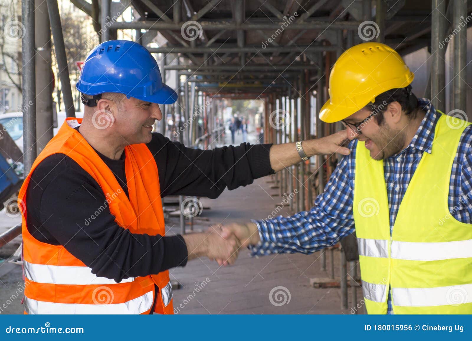Handshaking at Construction Site Stock Photo - Image of foreman ...