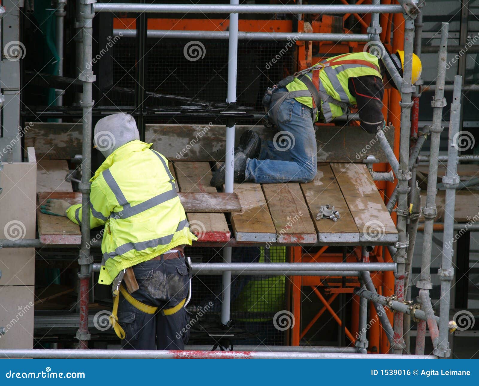 Construction workers stock photo. Image of renovate, people - 1539016