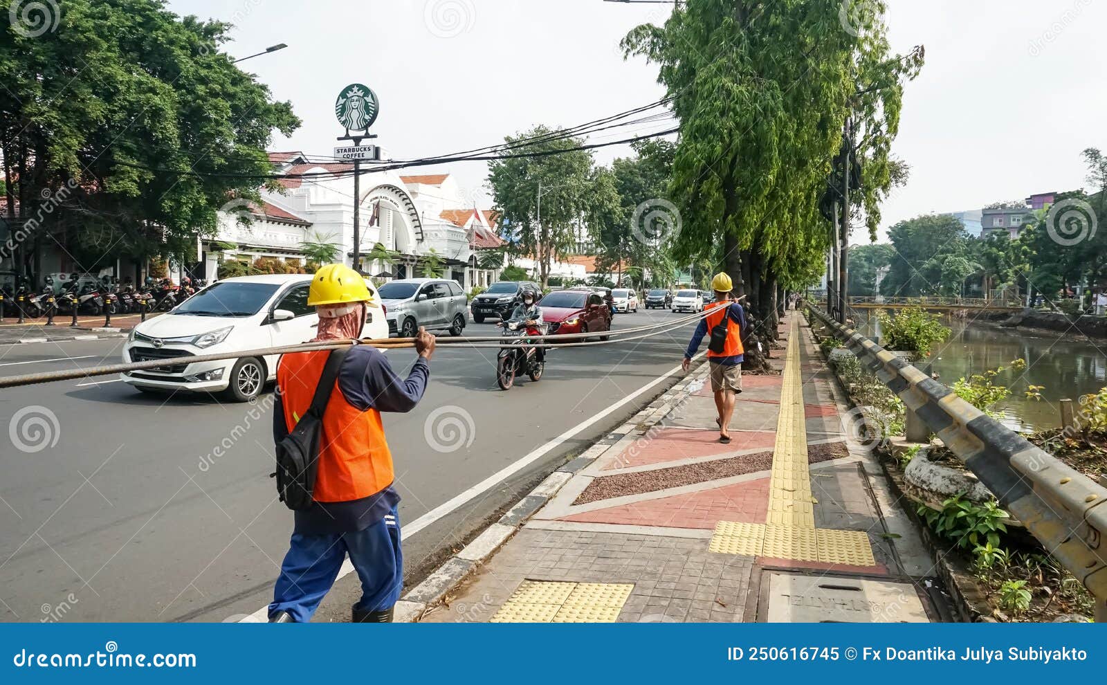 Construction Workers (also Known As Construction Laborers) Work on ...