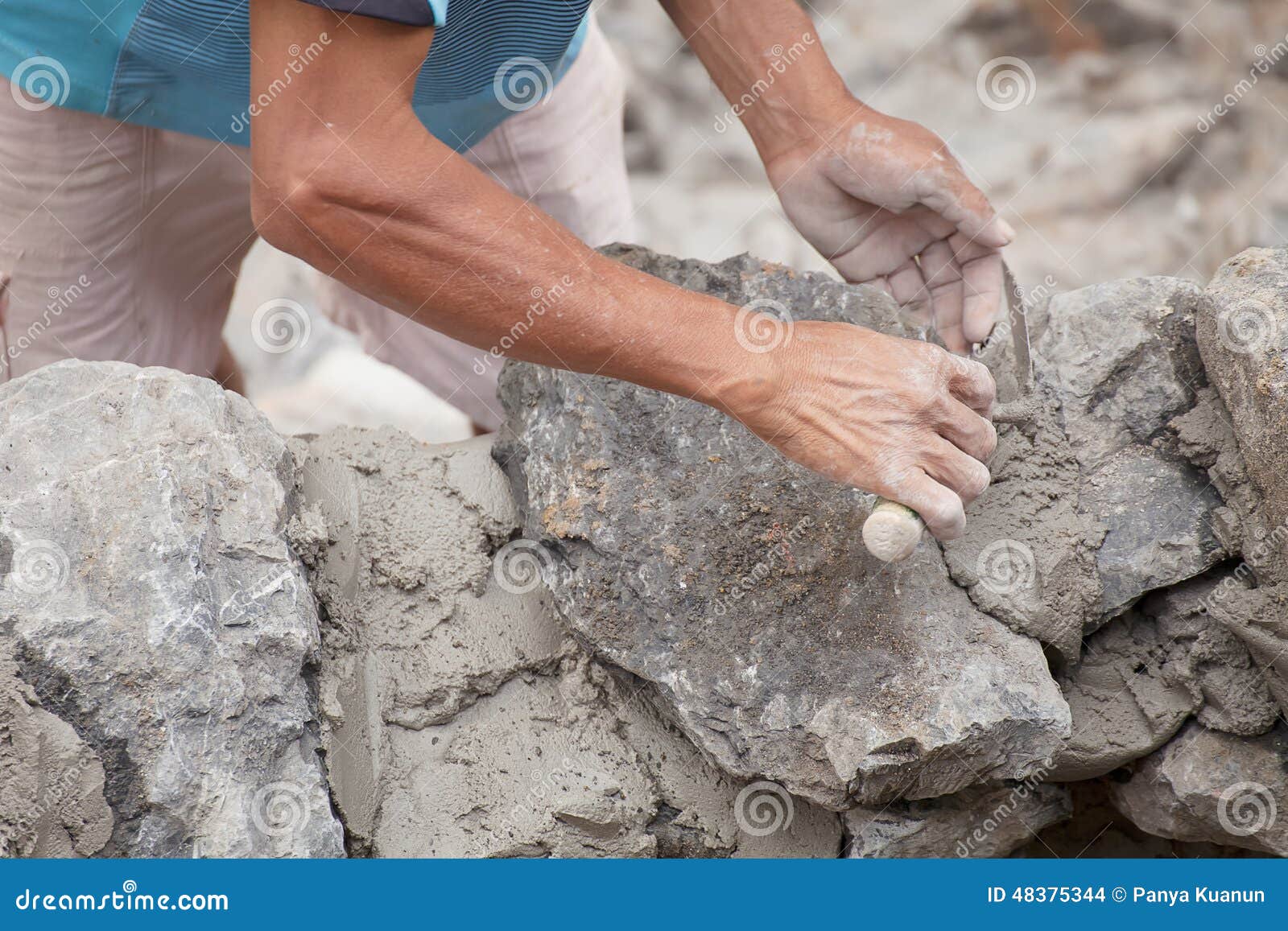 Construction Workers Build a Stone Wall Stock Photo - Image of ...