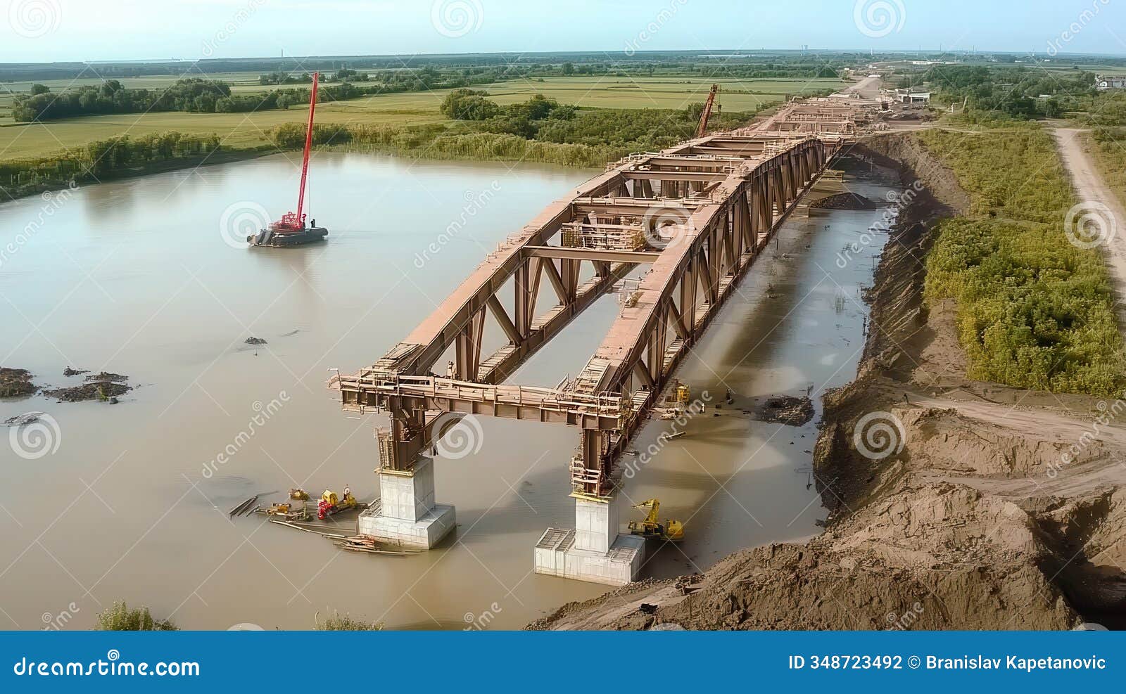 Construction Workers Building a Bridge Over Wide River Stock ...
