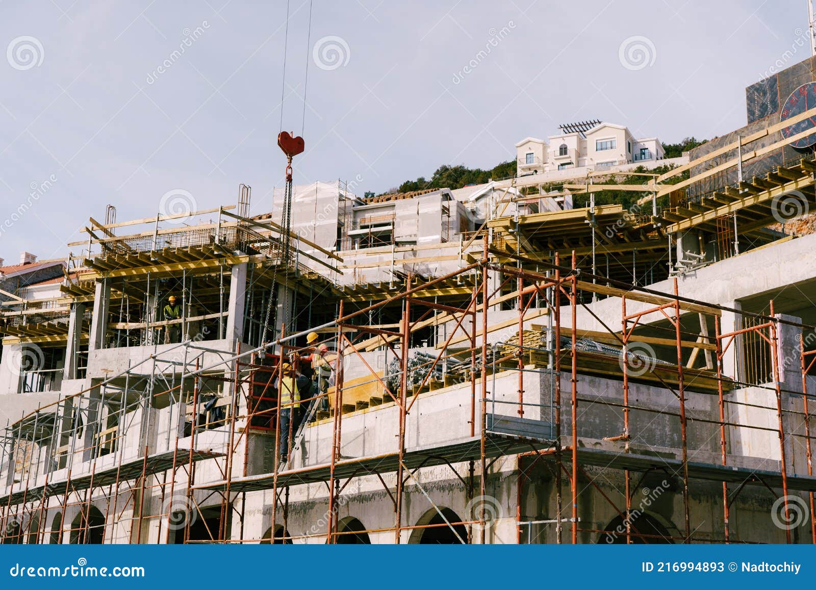 Construction Workers are Building a Modern High-rise Building. the ...