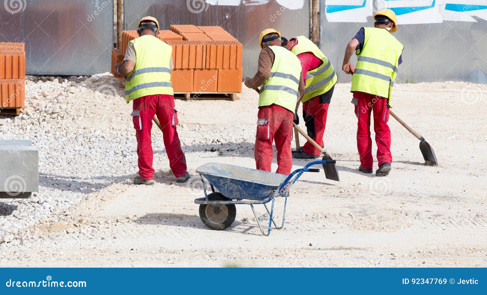 Construction Workers at Building Site Stock Image - Image of loading ...