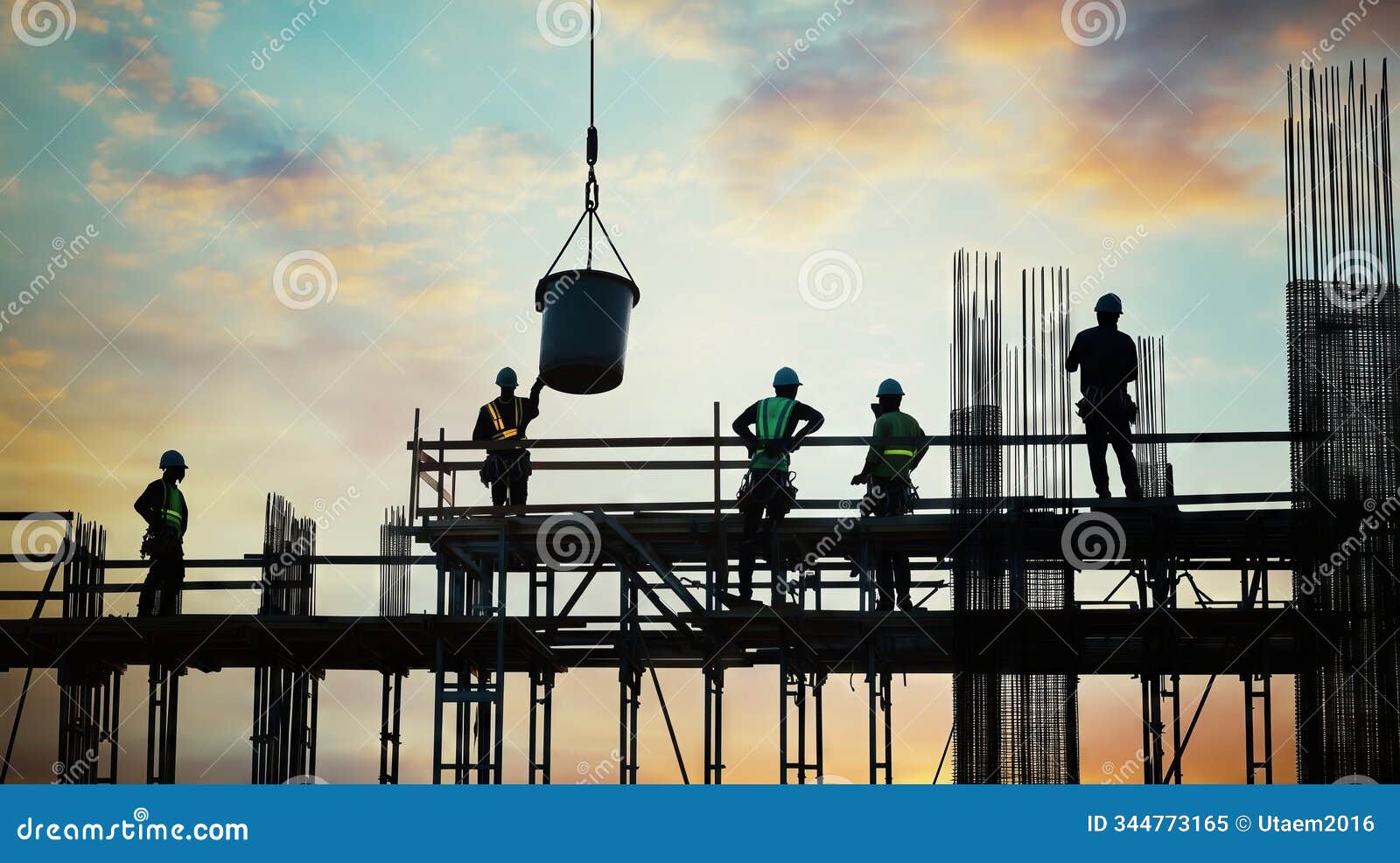 Construction Workers Building Structure at Sunset Stock Image - Image ...