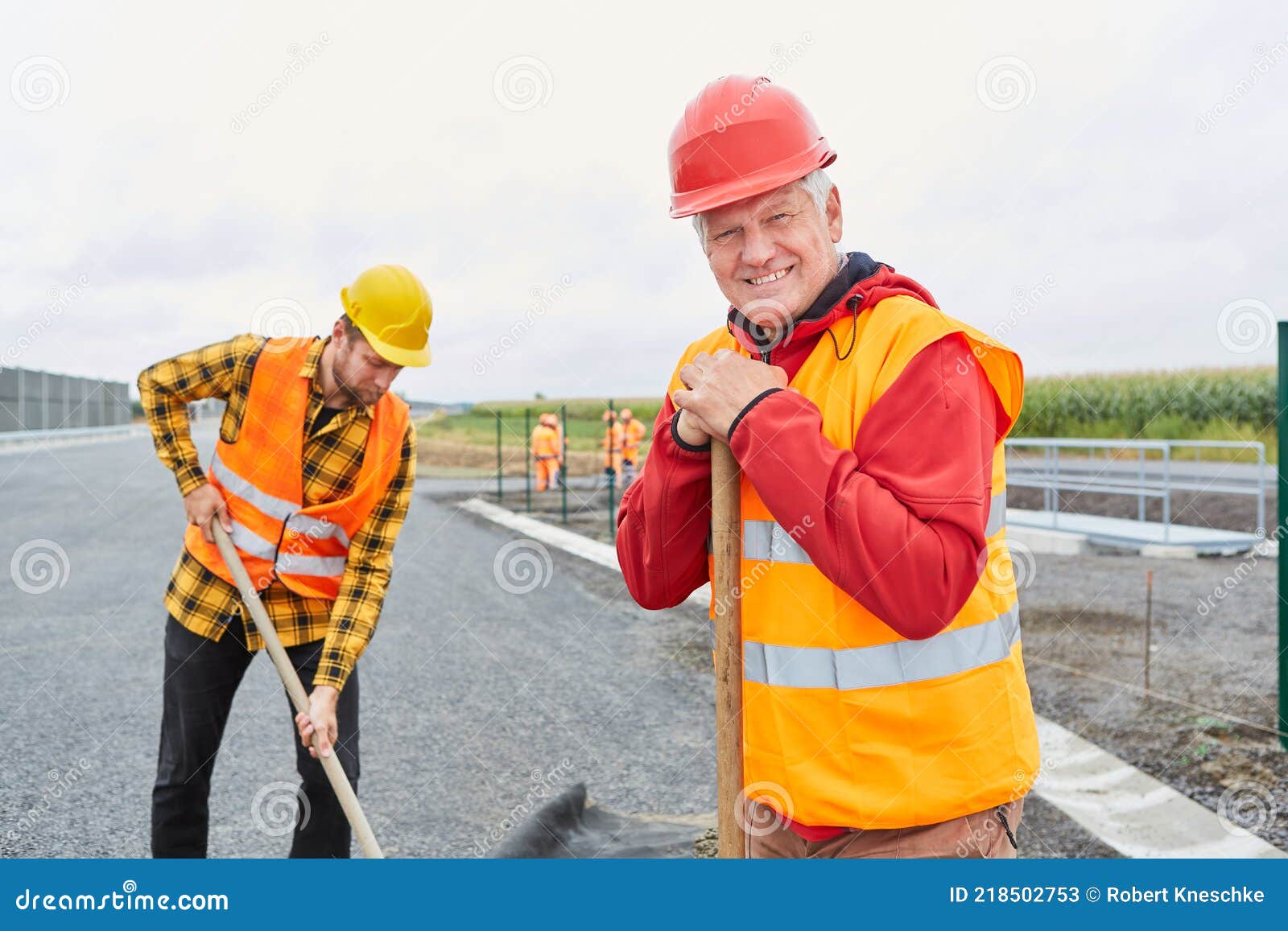 Construction Workers Building or Upgrading a Road Stock Image - Image ...