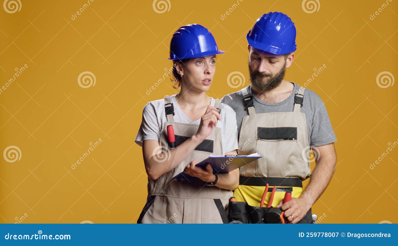 Construction Workers Calculating Measurement on Papers Stock Image ...