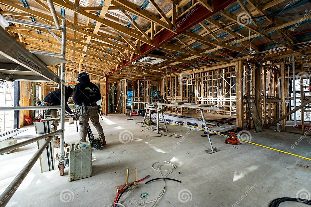 Construction Workers Captured in a House Undergoing Internal Renovation ...