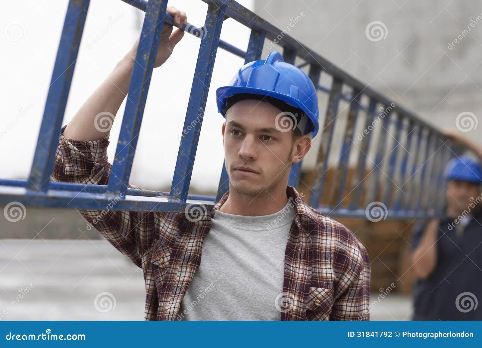 Construction Workers Carrying Ladder Stock Photo - Image of site ...