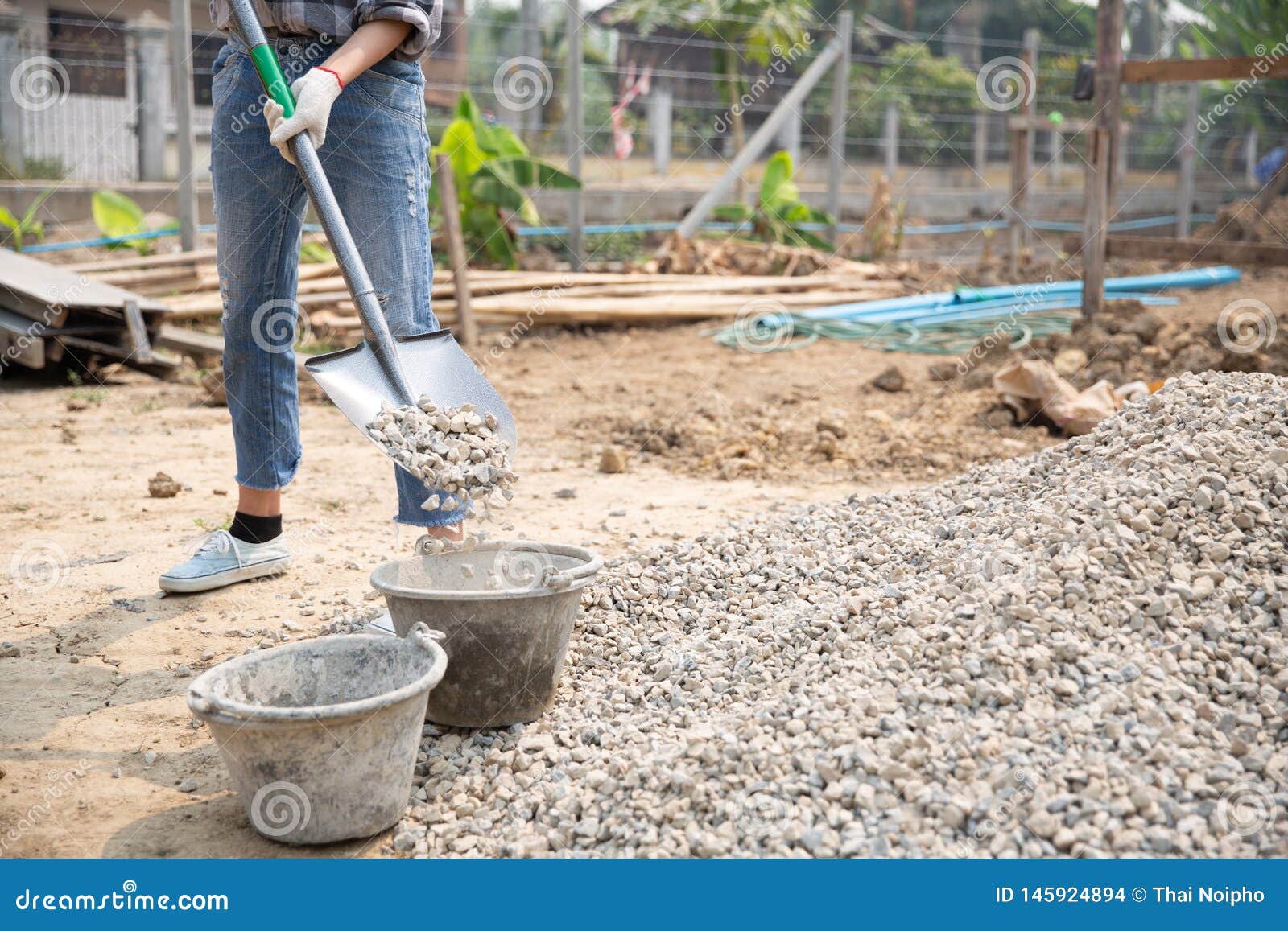 Construction Workers Carrying a Shovel To the Construction Site Stock ...