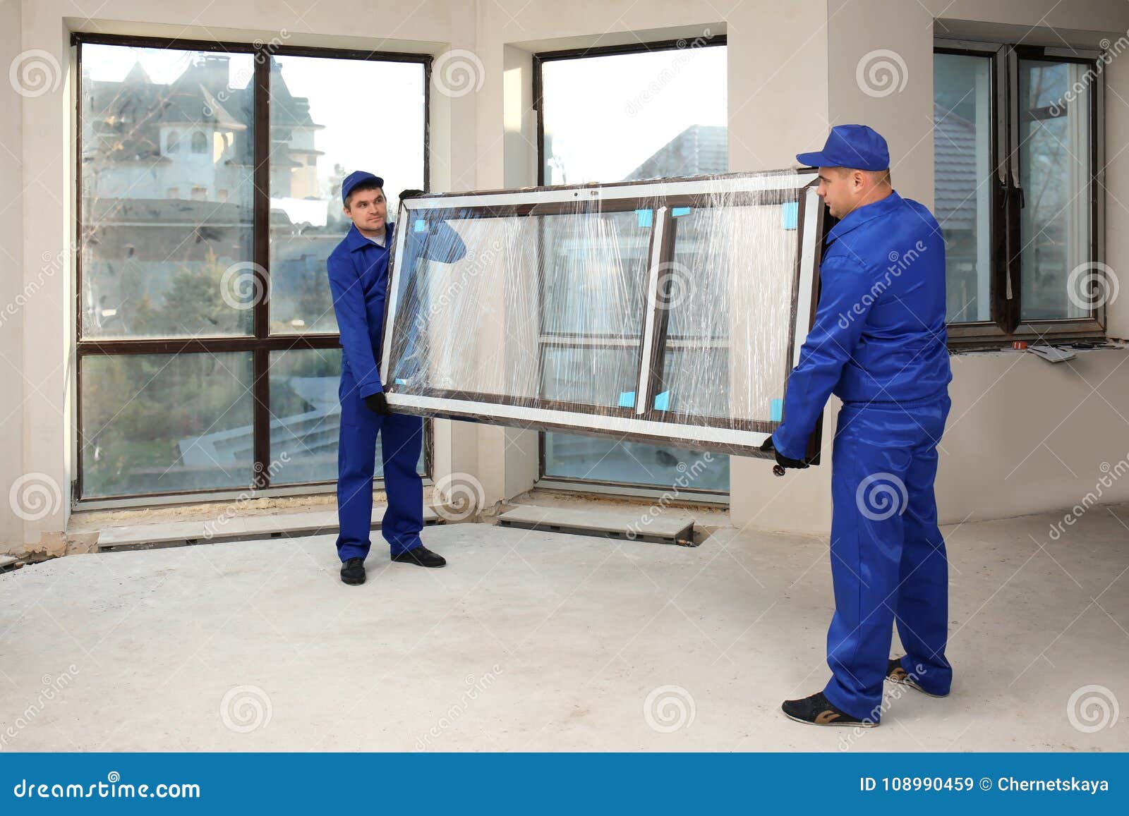 Construction Workers Carrying Window Glass Stock Image - Image of ...