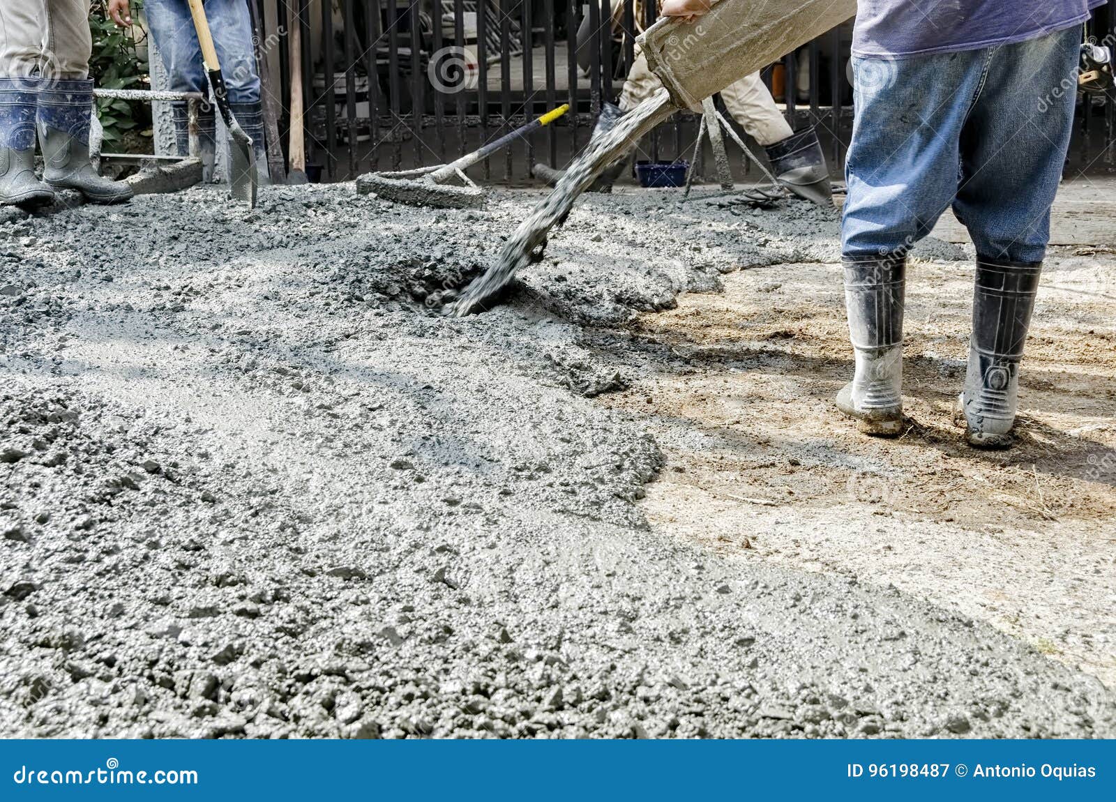 Construction Workers Cementing Road Stock Image - Image of labor, dirty ...