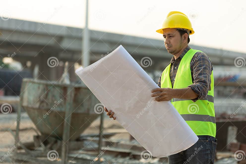 Construction Workers Check Drawings Plan Blueprint Stock Image - Image ...