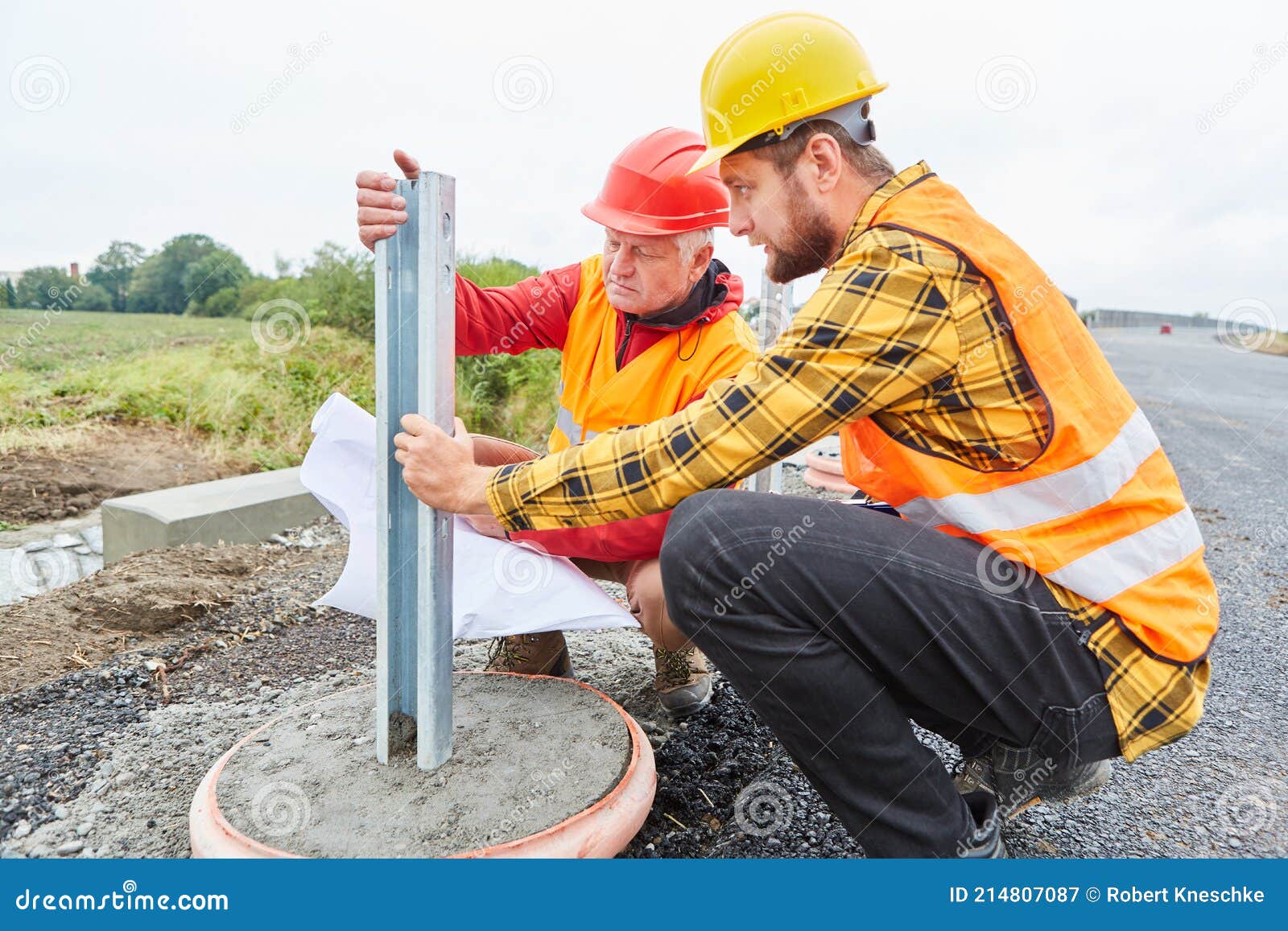 Construction Workers Check Construction on Construction Site Stock ...