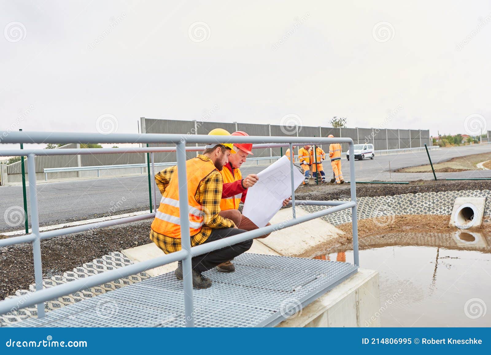 Construction Workers Check Construction on the Construction Site Stock ...
