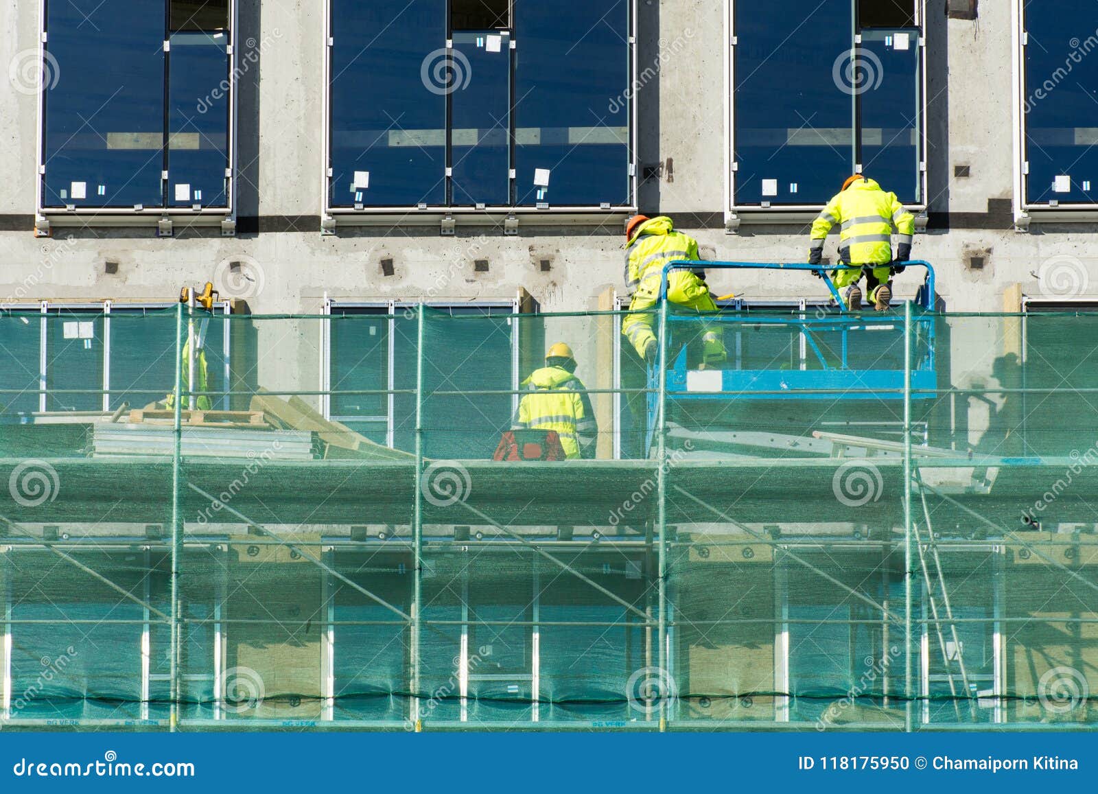 Construction Workers Collaborating in the Installation of Cement Stock ...