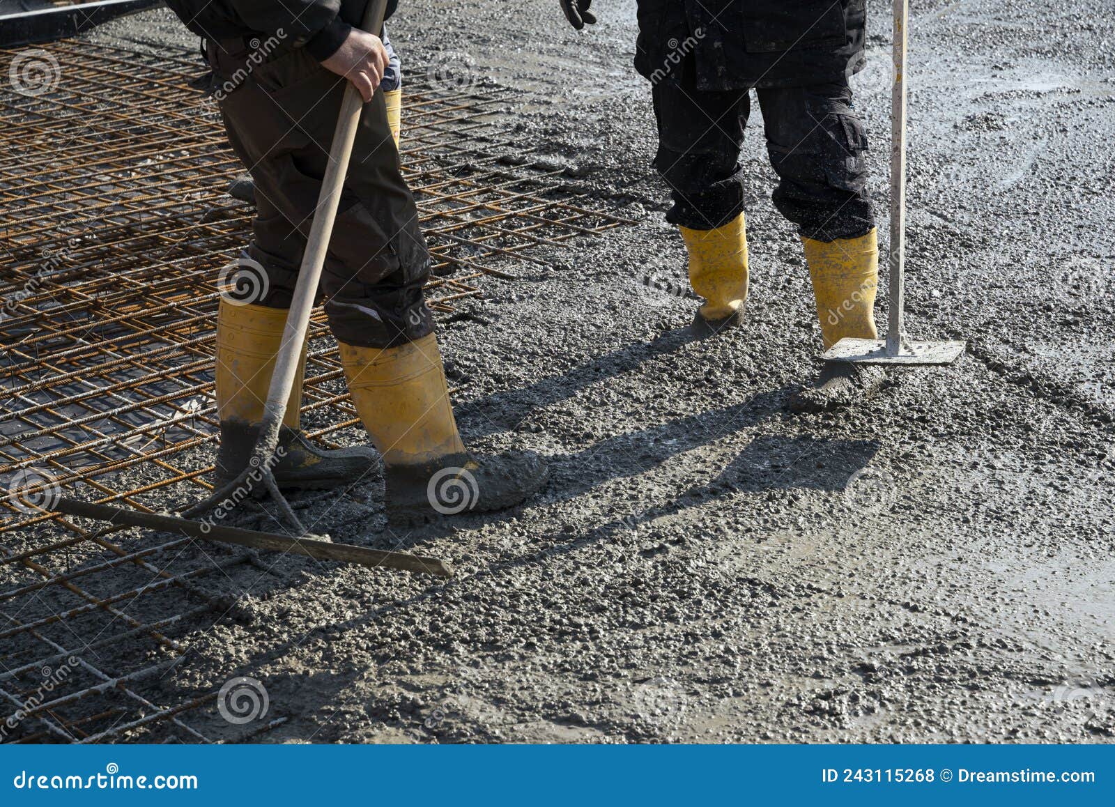 Construction Workers. Concrete Construction. Boots Stock Photo - Image ...