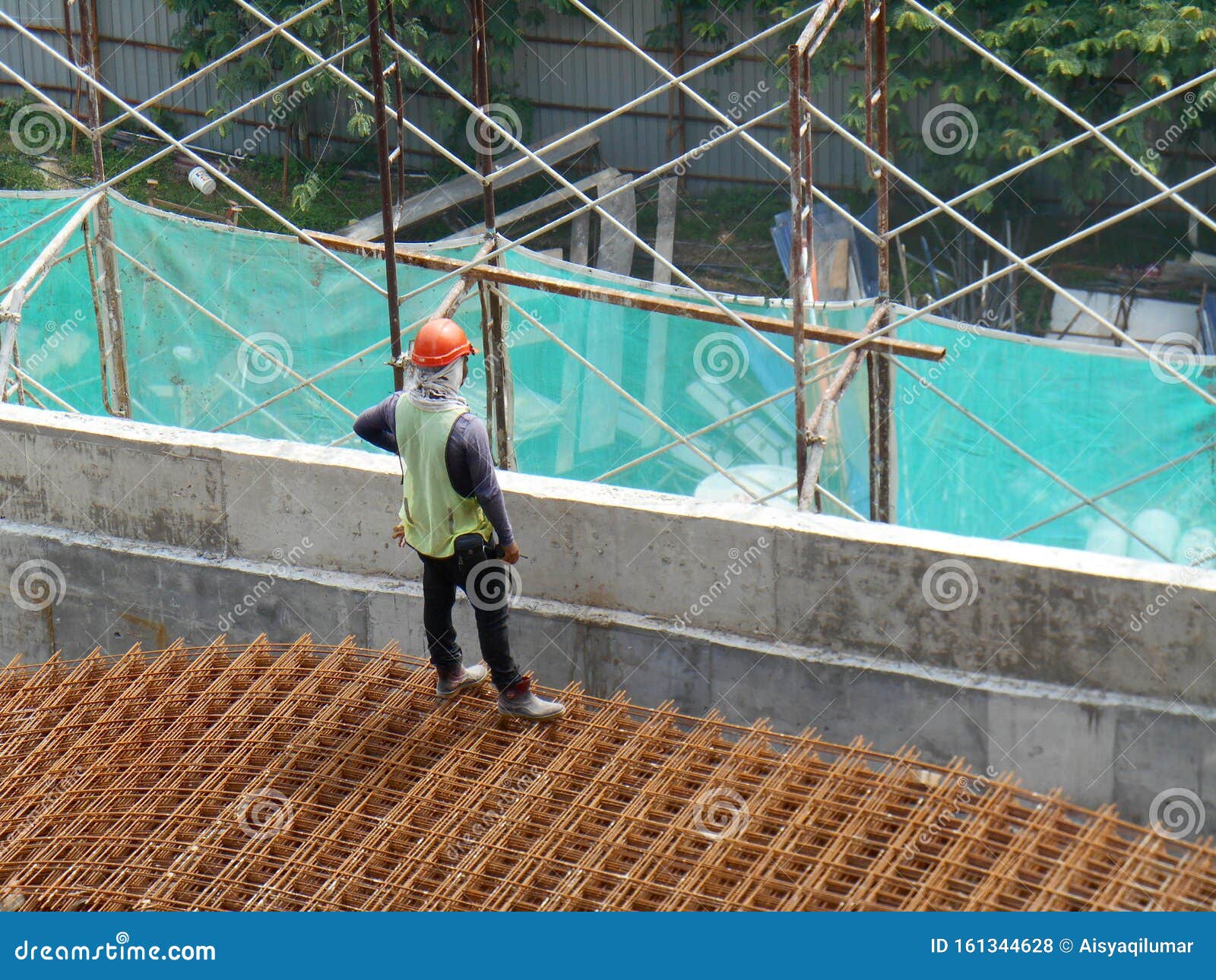 Construction Workers at the Construction Site Doing the daily Routine ...