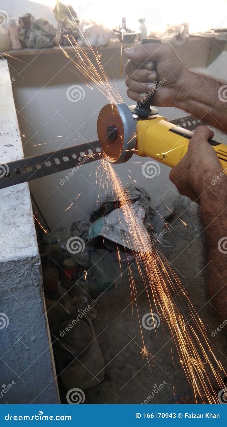 Construction Workers Cutting Steel for Fabrication Work at a Under ...