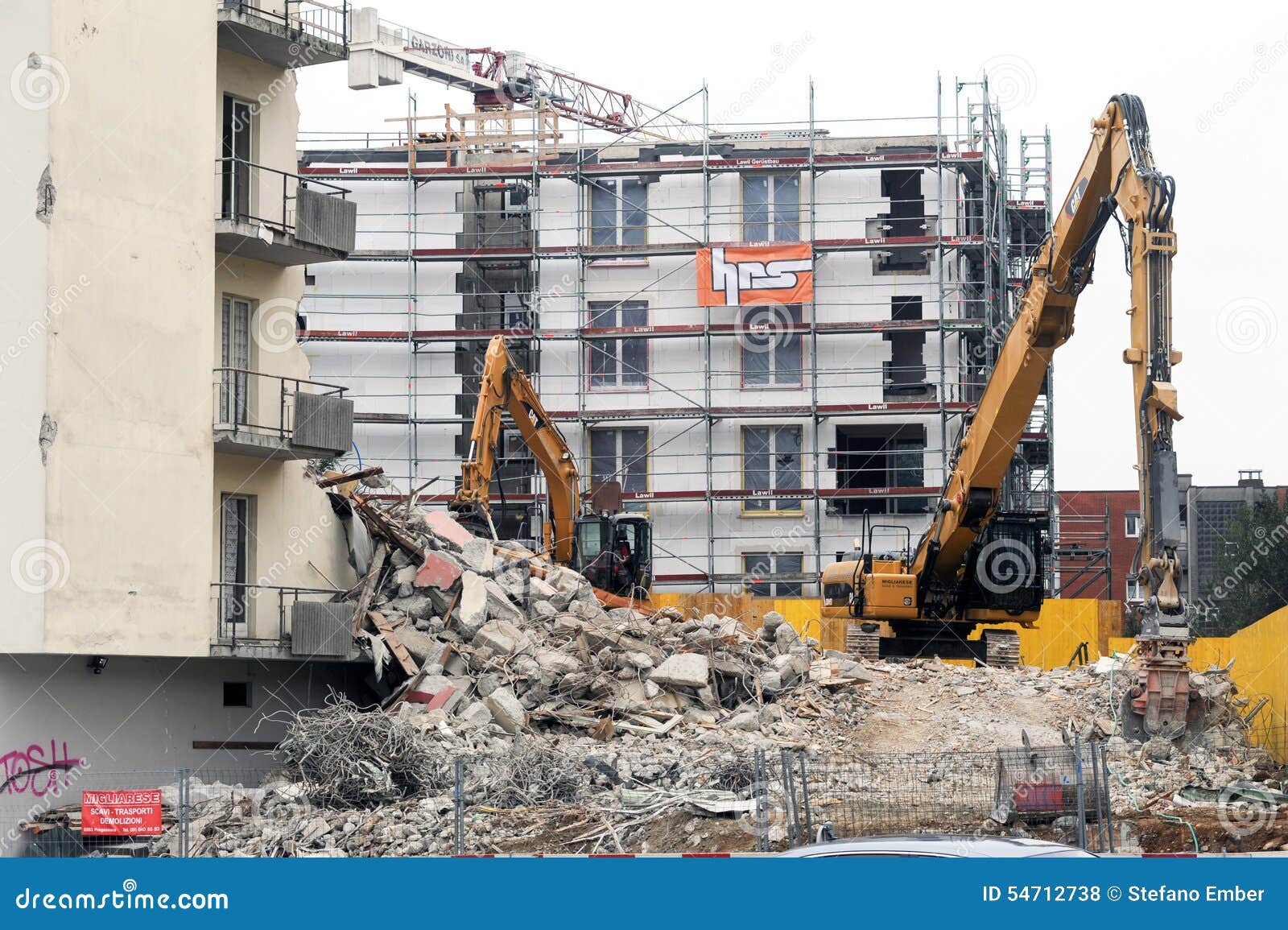 Construction Workers during Demolition of a House with a Crane ...