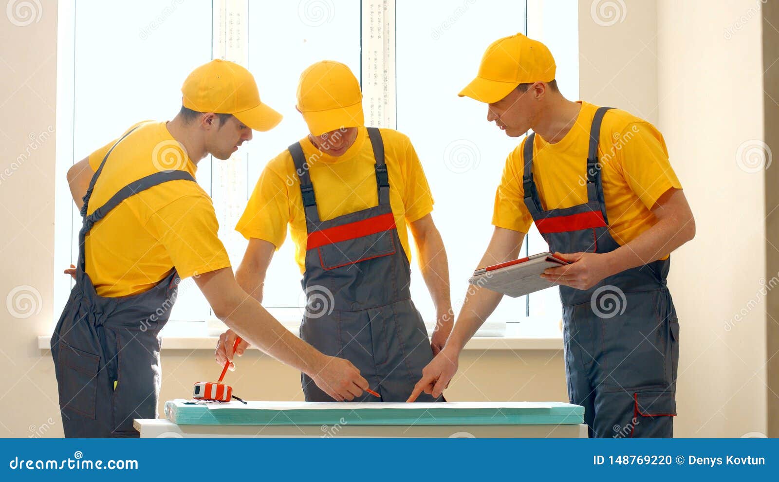 Construction Workers Discussing New Project Plan. Stock Photo - Image ...