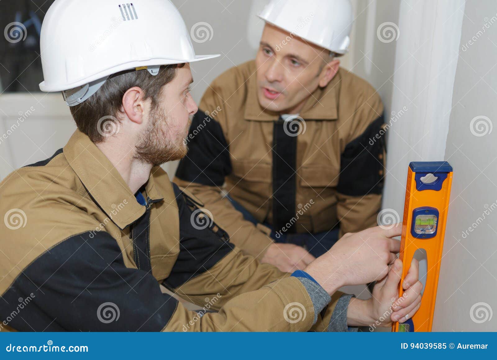Construction Workers Discussing Plan Building in Office Stock Image ...