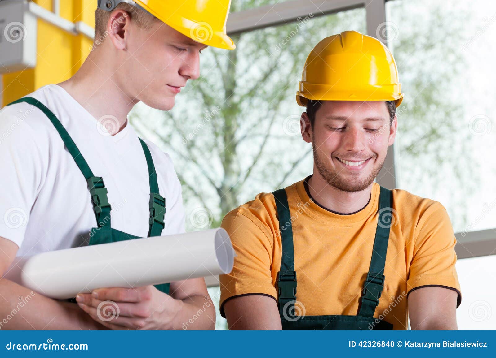 Construction Workers Discussing Project Stock Photo - Image of employee ...