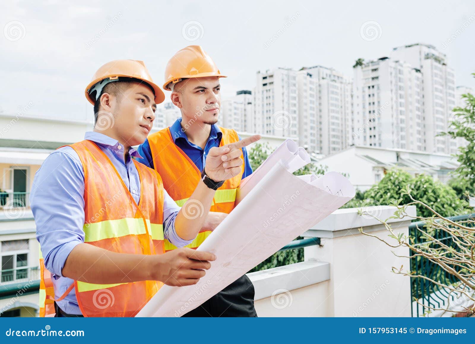 Construction Workers Discussing Project Stock Image - Image of engineer ...