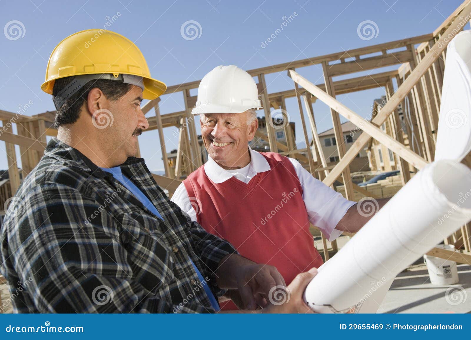 Construction Workers Discussing at Site Stock Image - Image of engineer ...