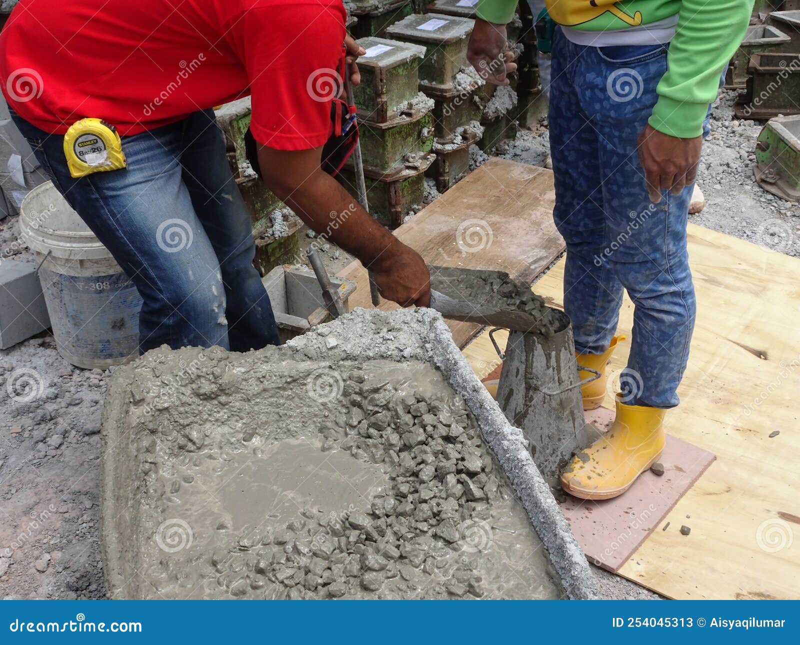 Construction Workers Doing Slump Test Using Appropriate Equipment at ...