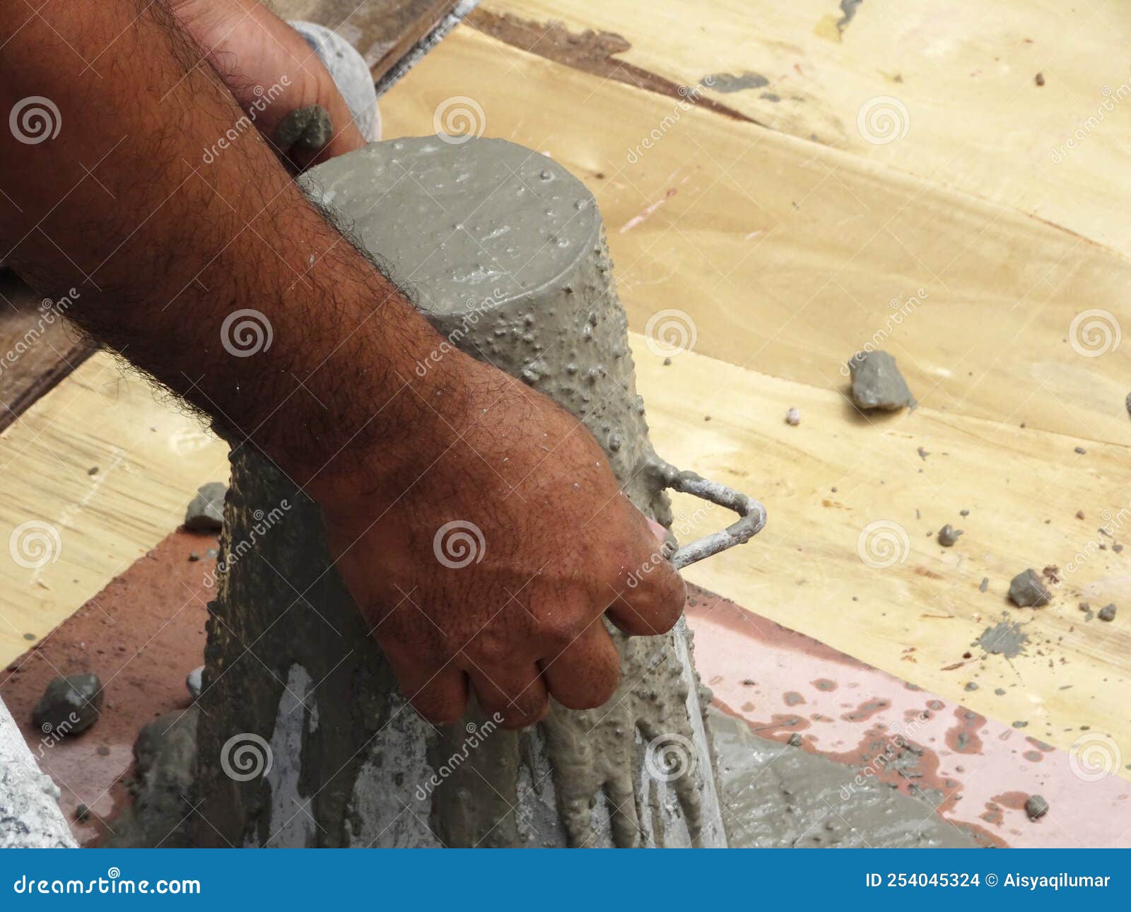 Construction Workers Doing Slump Test Using Appropriate Equipment at ...