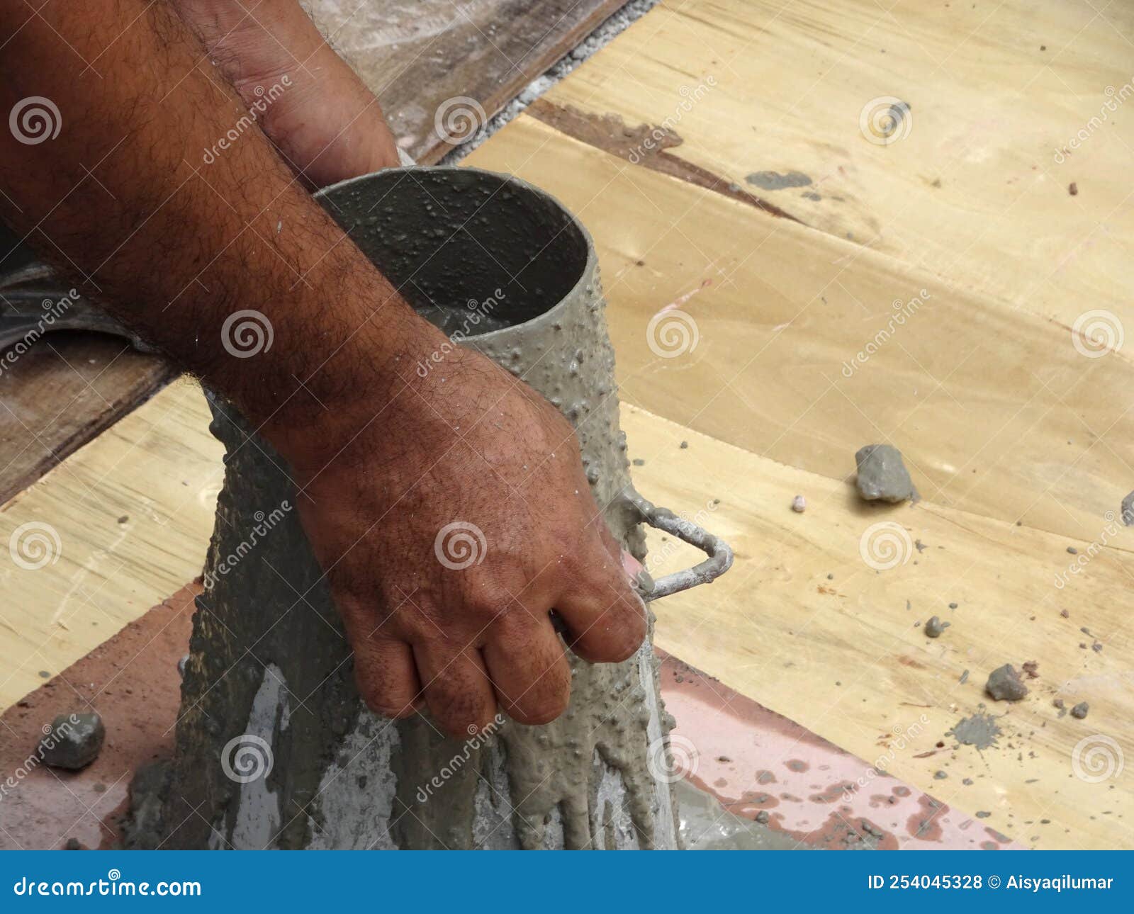 Construction Workers Doing Slump Test Using Appropriate Equipment at ...