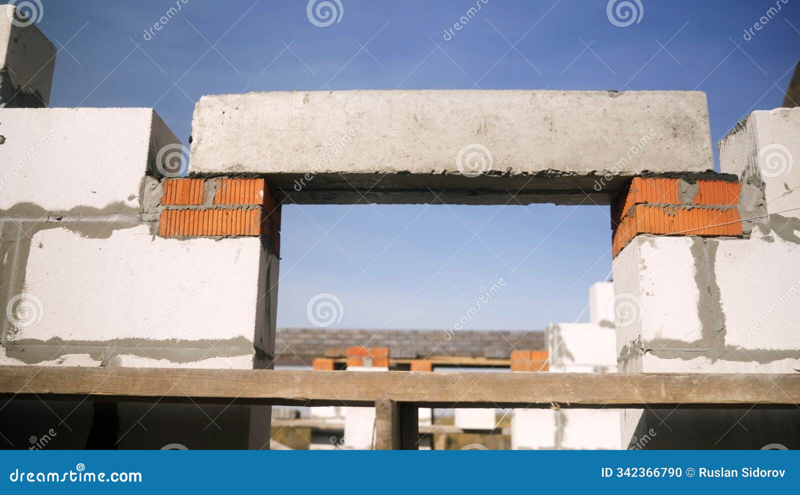 Construction Workers Engaged in Installing a Concrete Lintel for a ...