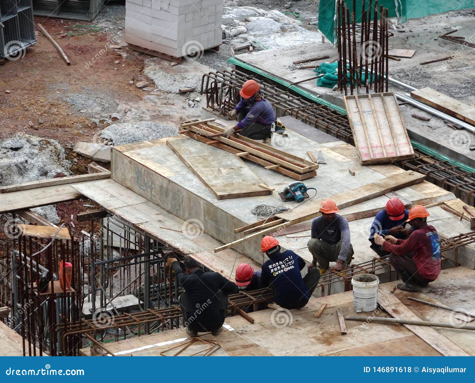 Construction Workers Fabricated Timber Form Work at the Construction ...