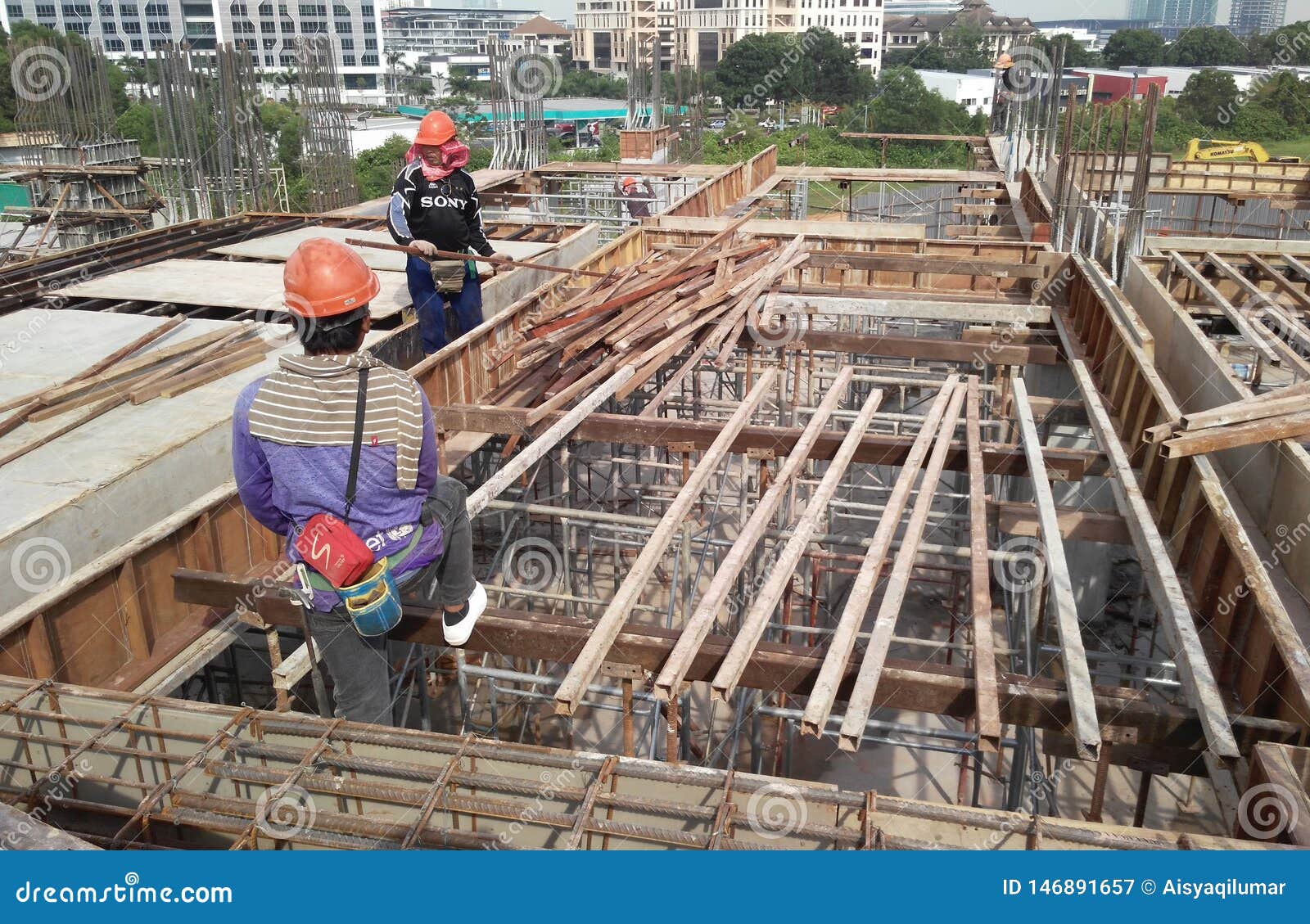 Construction Workers Fabricated Timber Form Work at the Construction ...