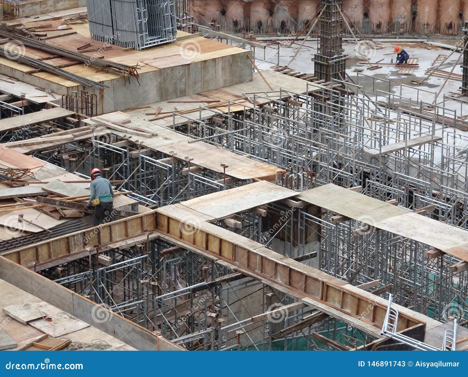 Construction Workers Fabricated Timber Form Work at the Construction ...