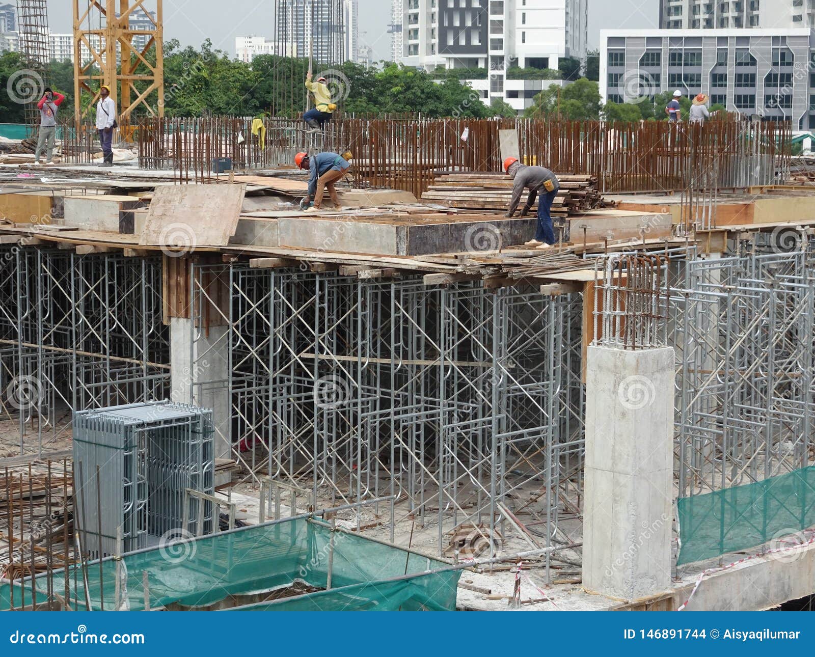 Construction Workers Fabricated Timber Form Work at the Construction ...