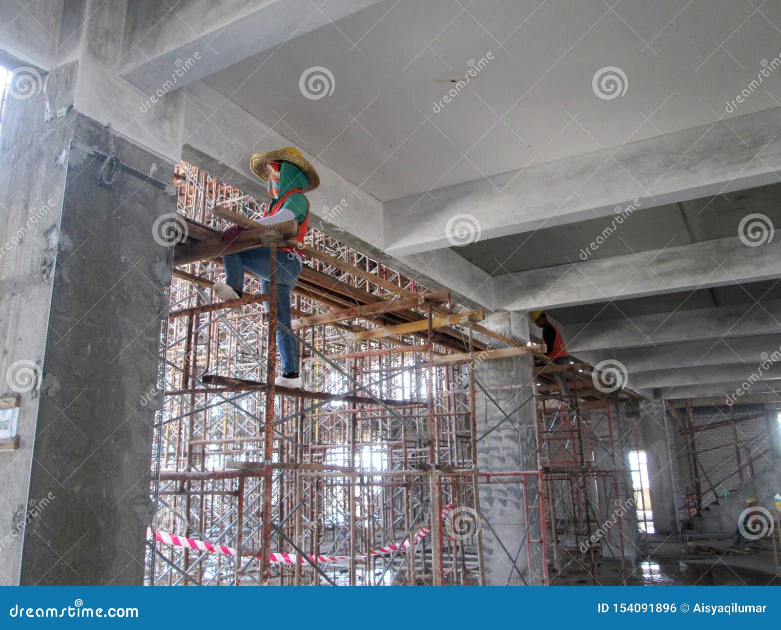 Construction Workers Fabricated Timber Form Work at the Construction ...