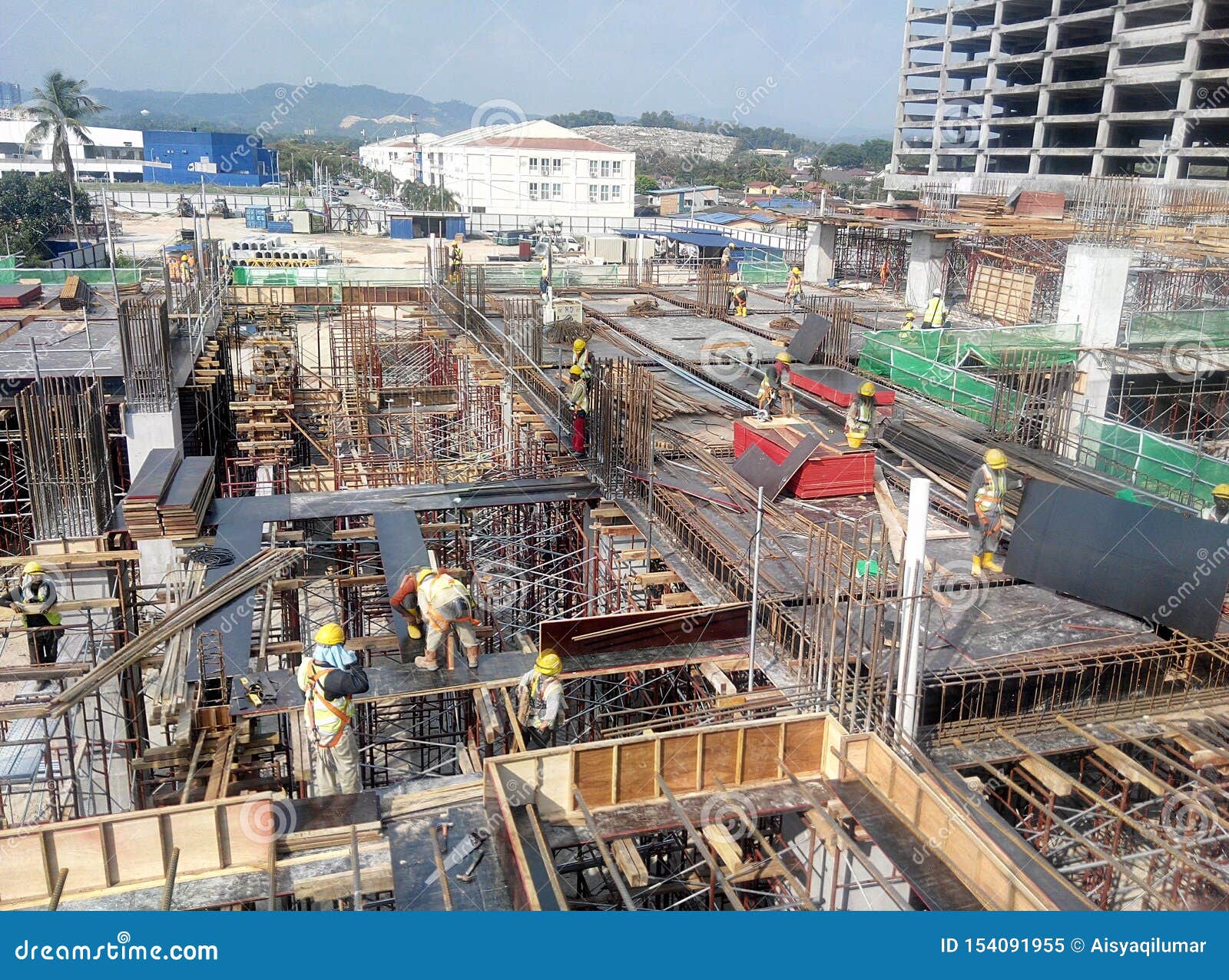 Construction Workers Fabricated Timber Form Work at the Construction ...