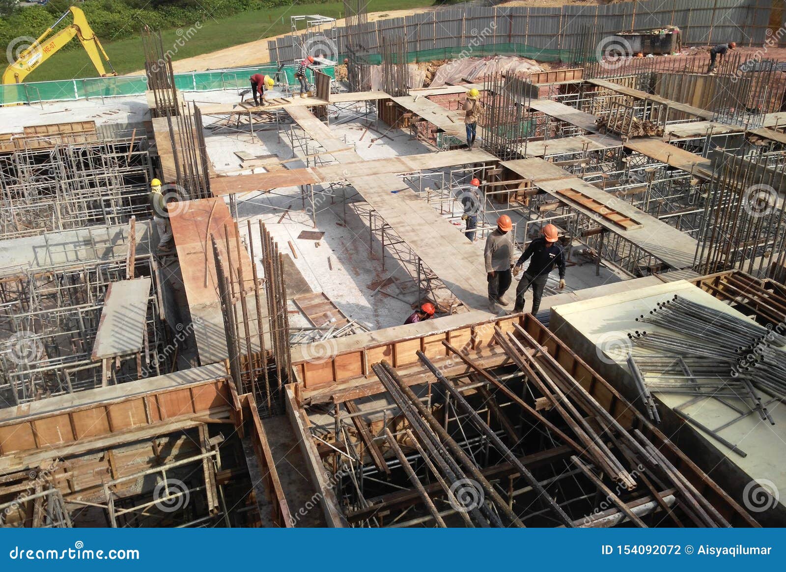 Construction Workers Fabricated Timber Form Work at the Construction ...