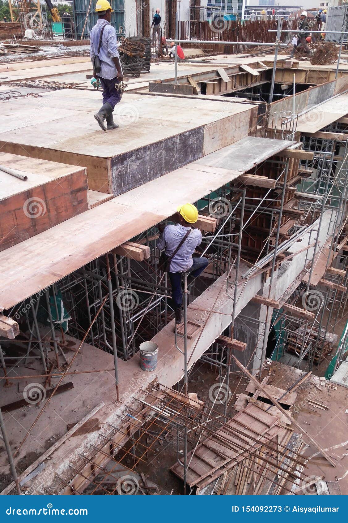Construction Workers Fabricated Timber Form Work at the Construction ...