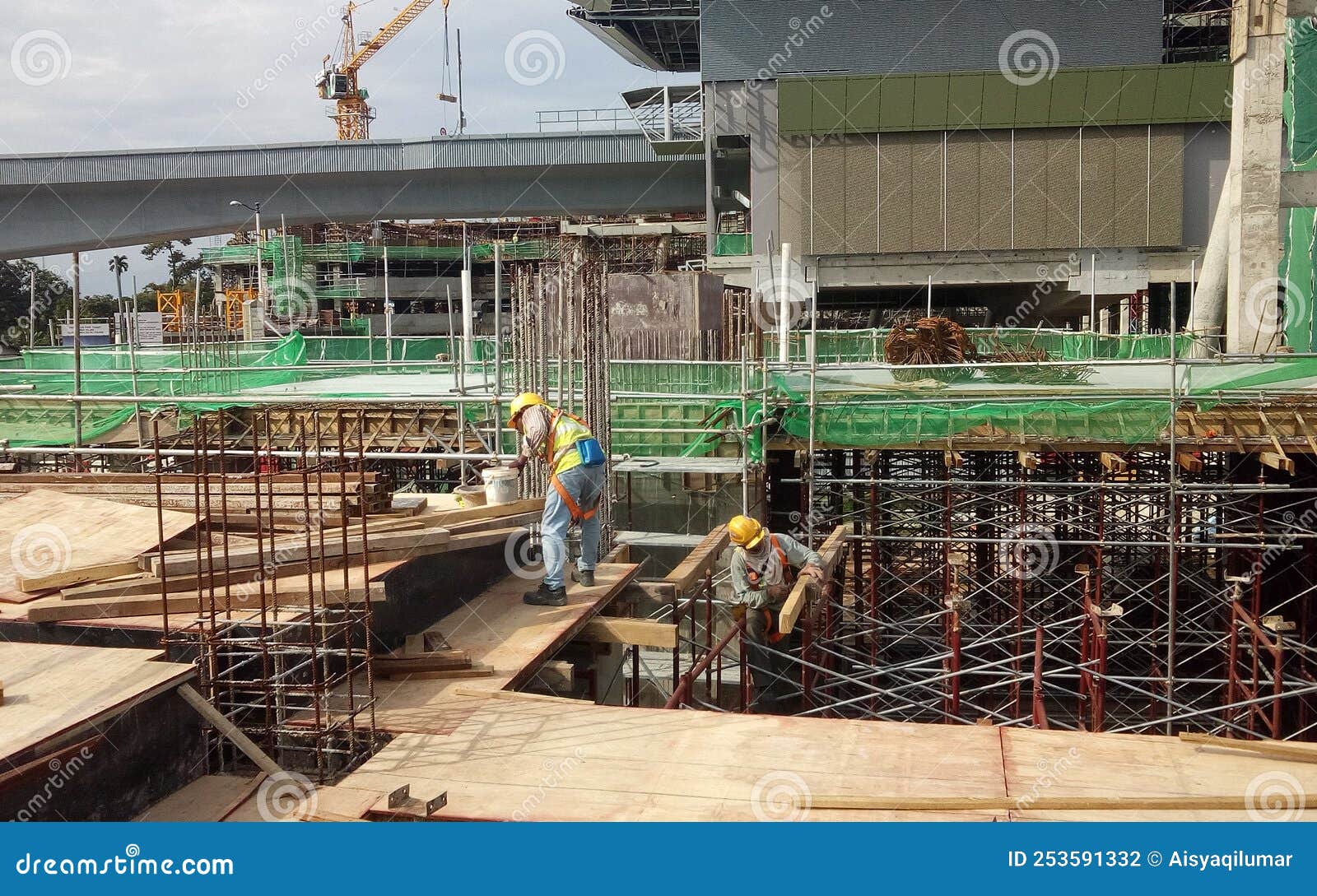 Construction Workers Fabricated Timber Form Work at the Construction ...