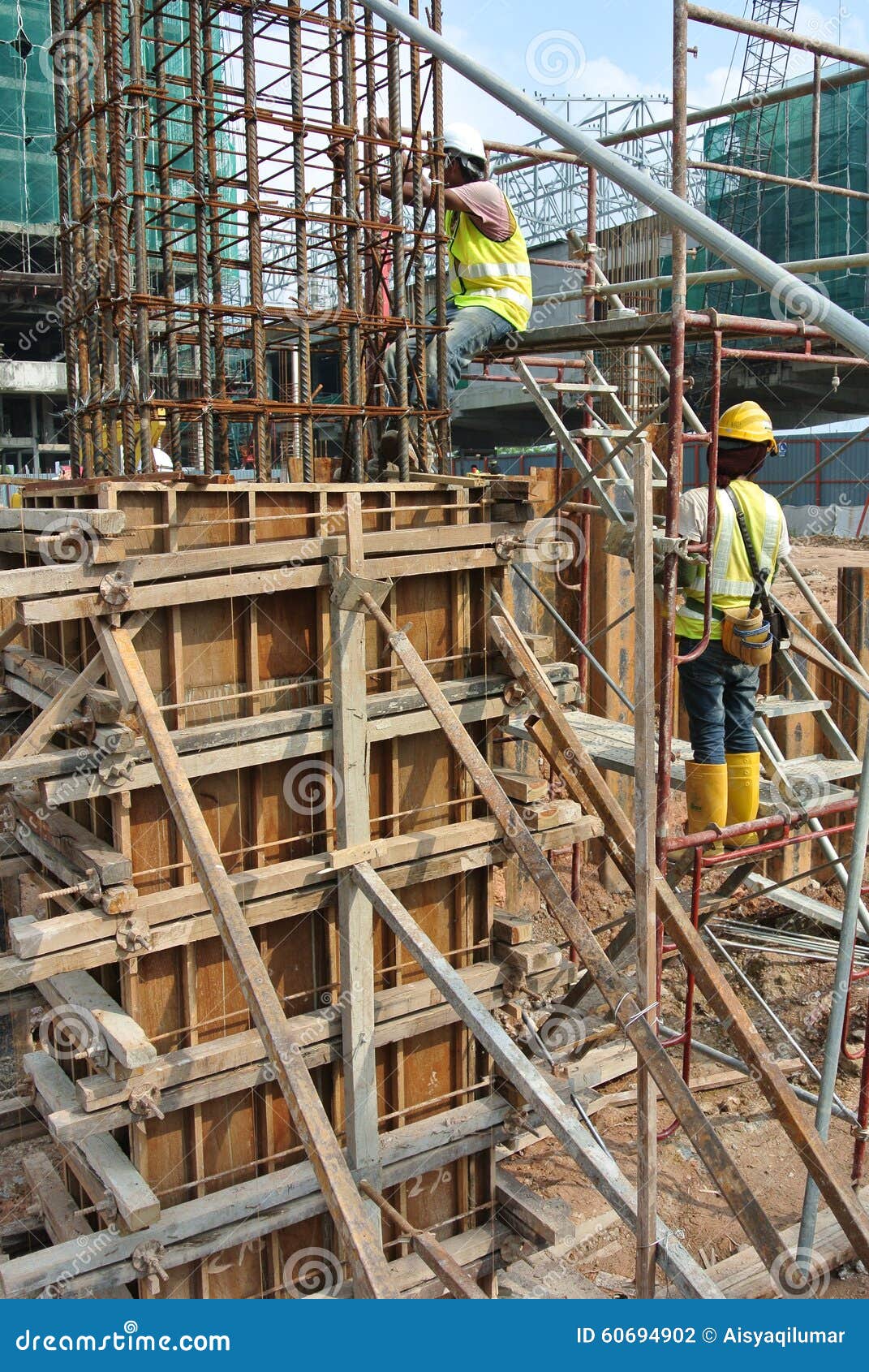 Construction Workers Fabricating Timber Column Formwork at the ...