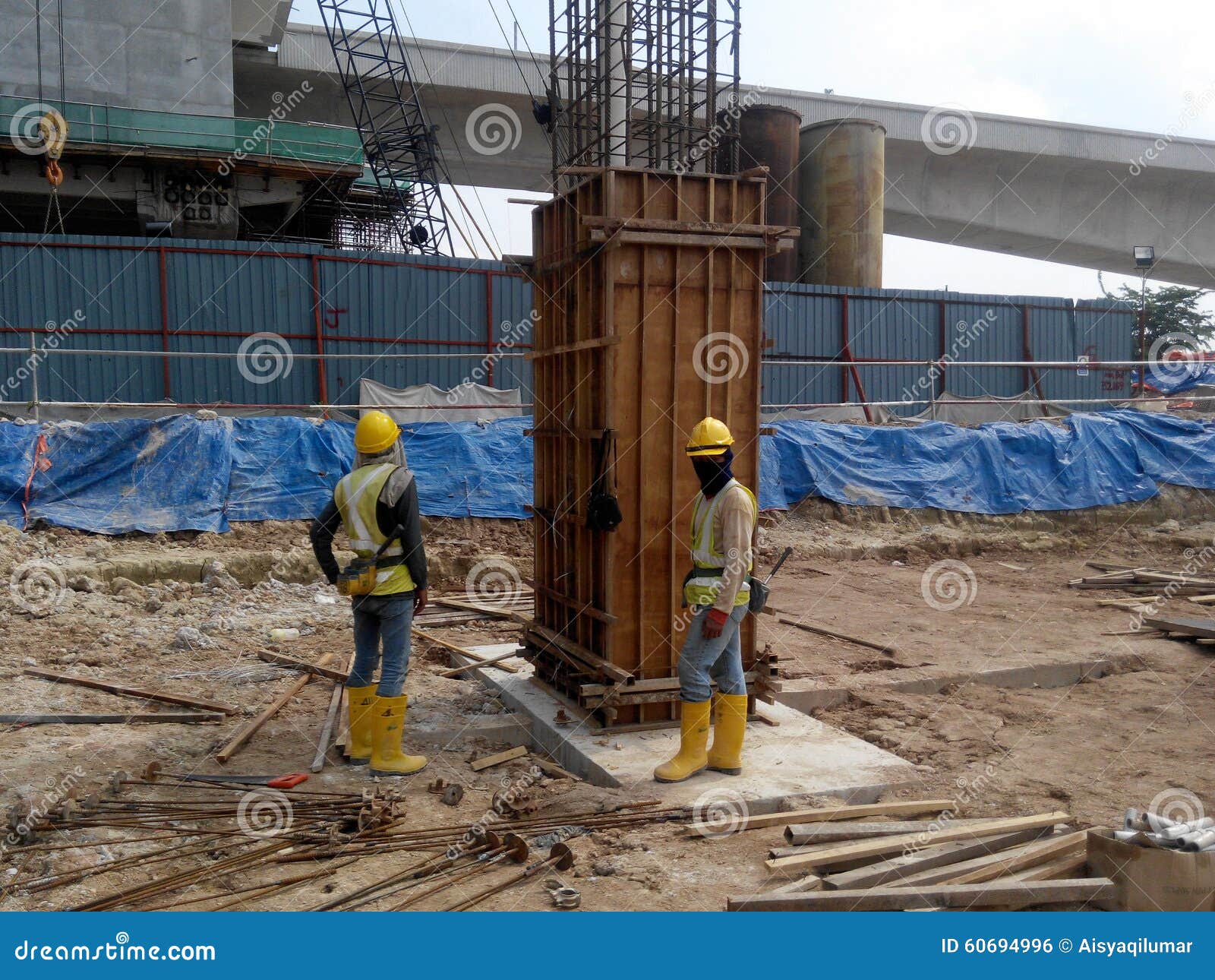 Construction Workers Fabricating Timber Column Formwork at the ...