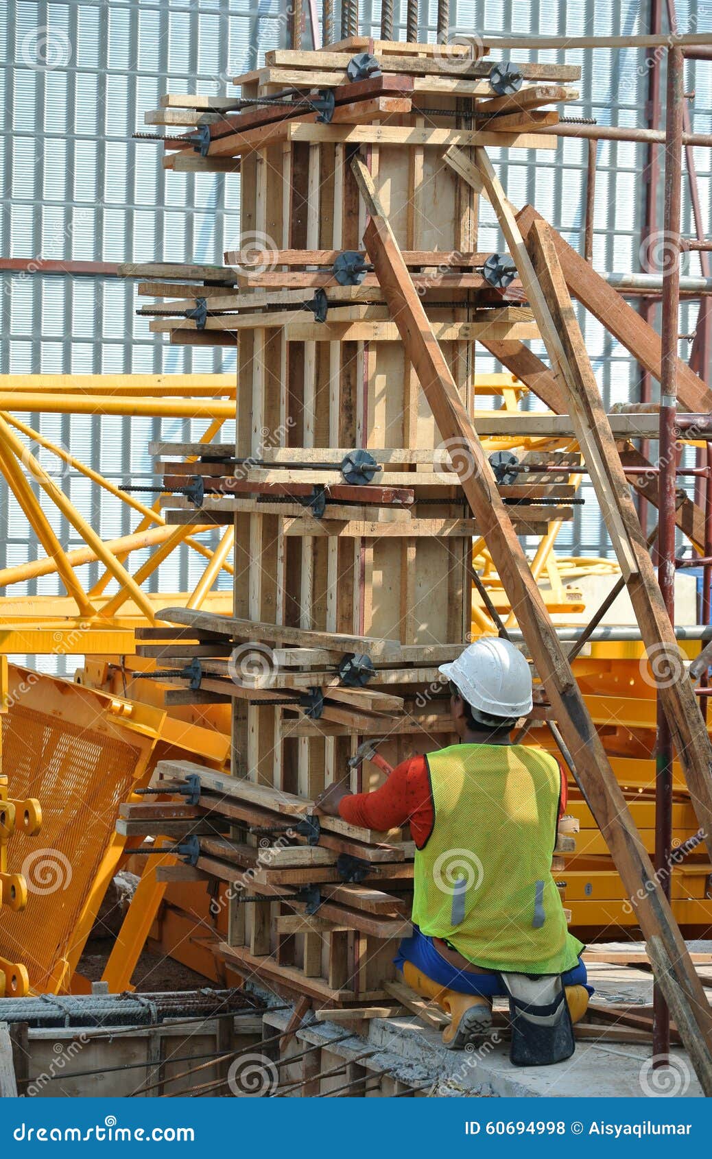 Construction Workers Fabricating Timber Column Formwork at the ...