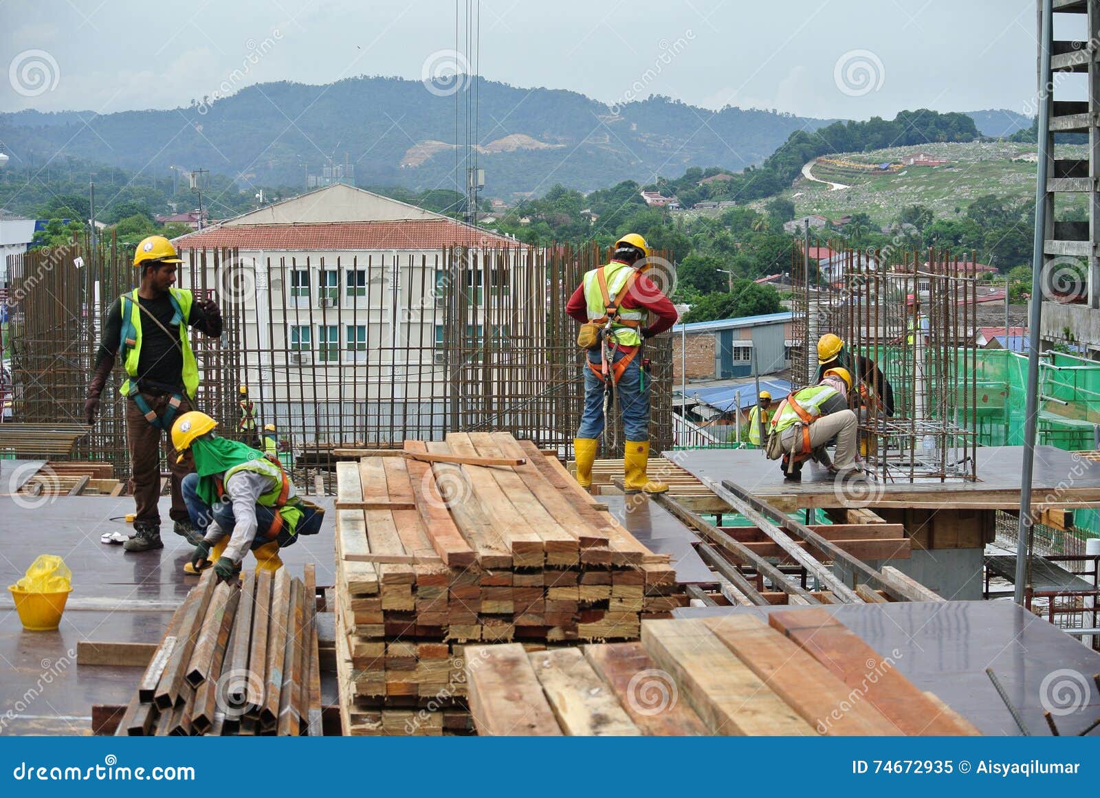 Construction Workers Fabricating Timber Form Work at the Construction ...