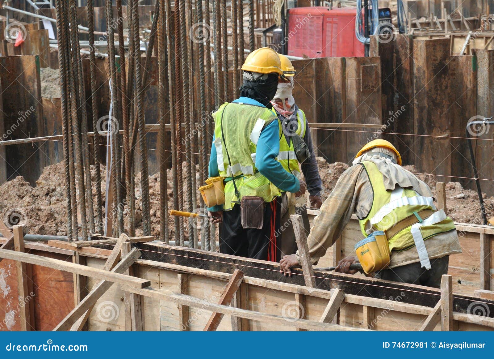Construction Workers Fabricating Timber Form Work at the Construction ...