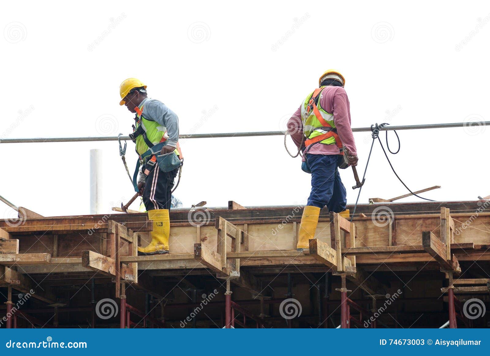 Construction Workers Fabricating Timber Form Work at the Construction ...