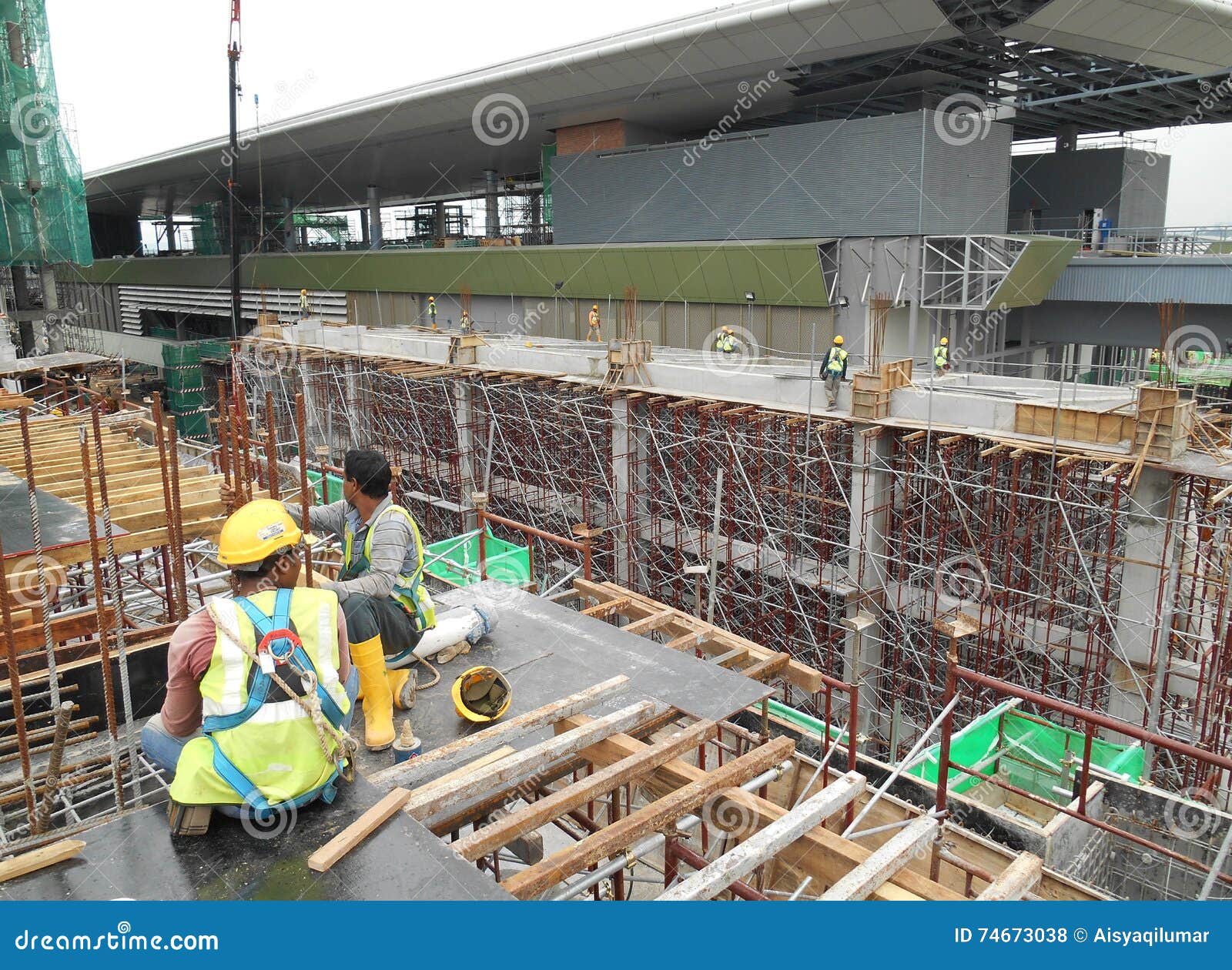 Construction Workers Fabricating Timber Form Work at the Construction ...