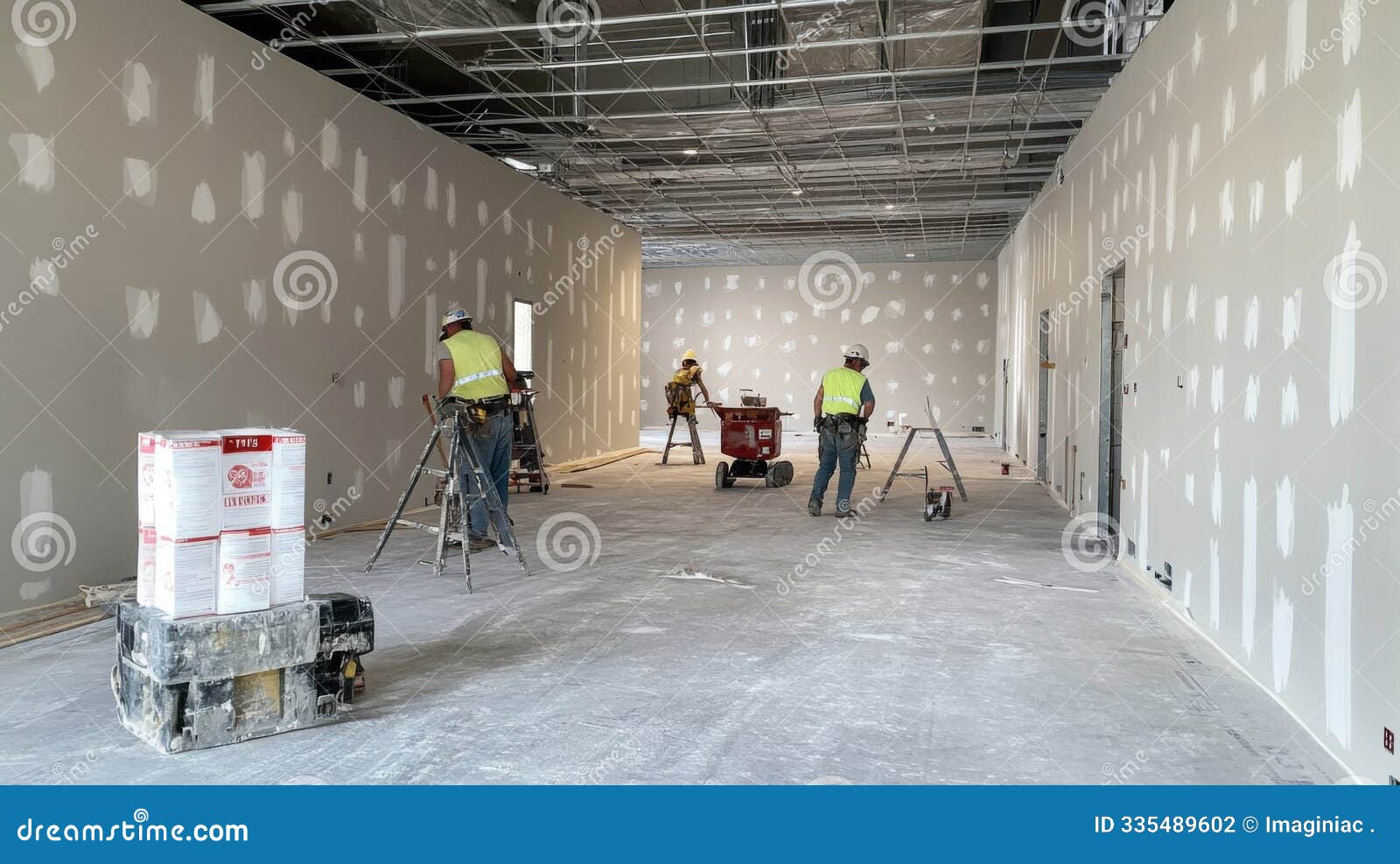 Construction Workers Finishing Interior Walls of a Building Stock ...
