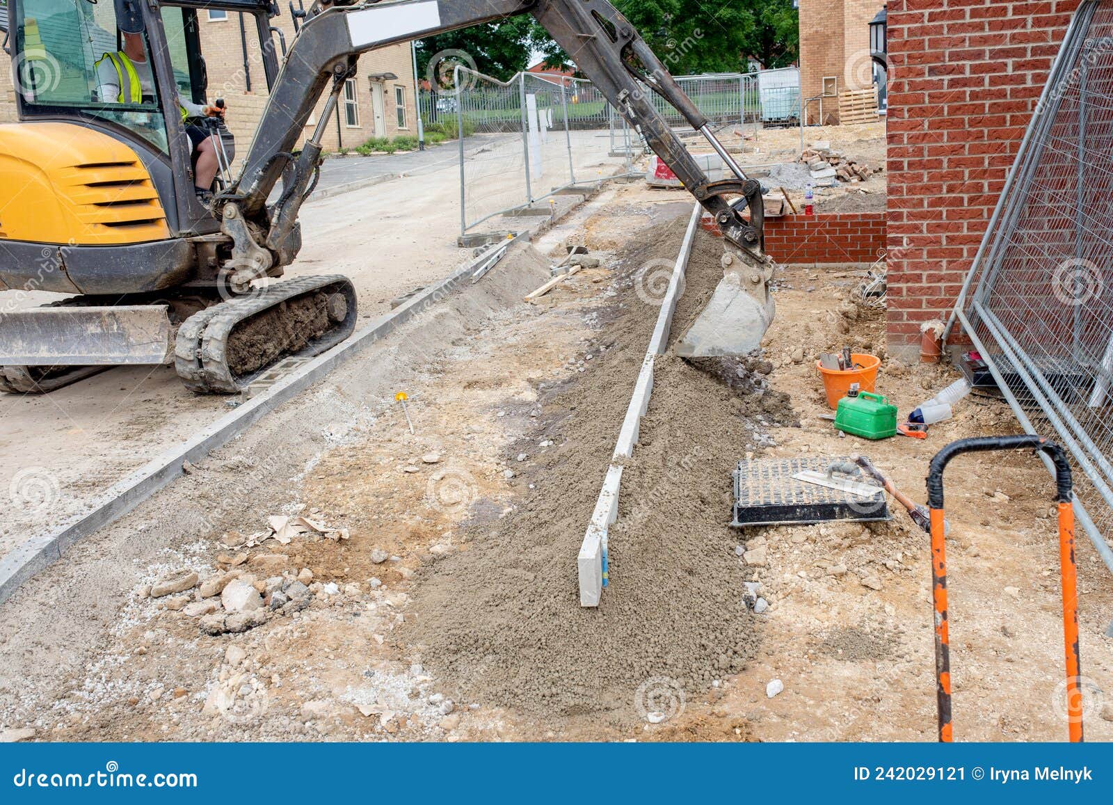 Construction Workers Finishing Construction of New Residential House ...
